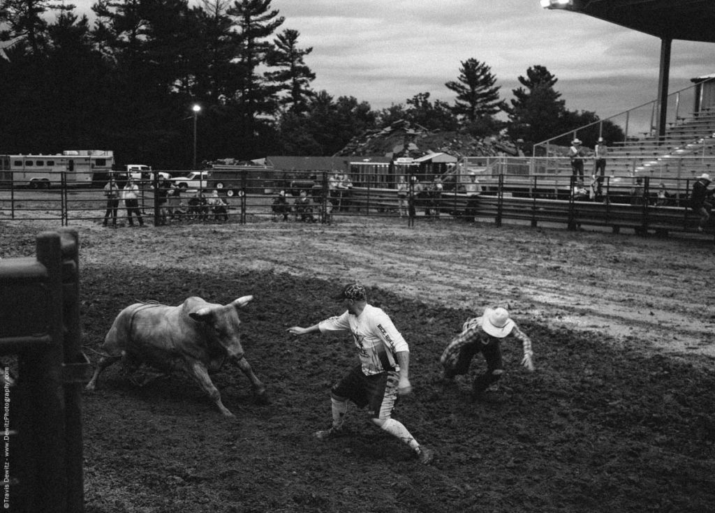 Bull Riding in the Mud Under the Lights